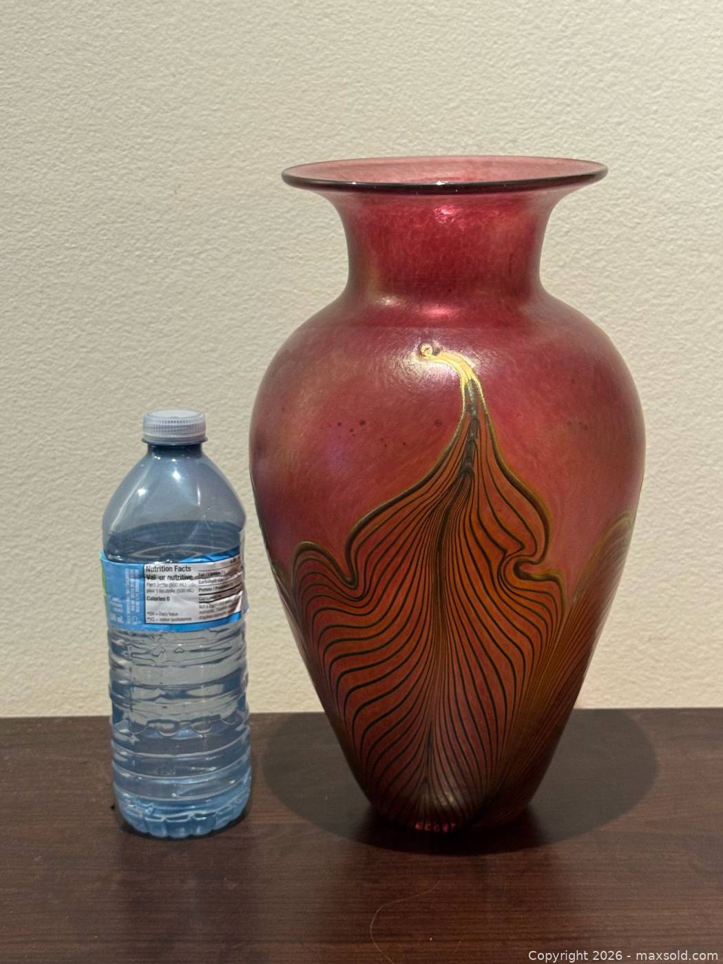 Robert Held ruby iridescent pulled feather vase | Maxsold