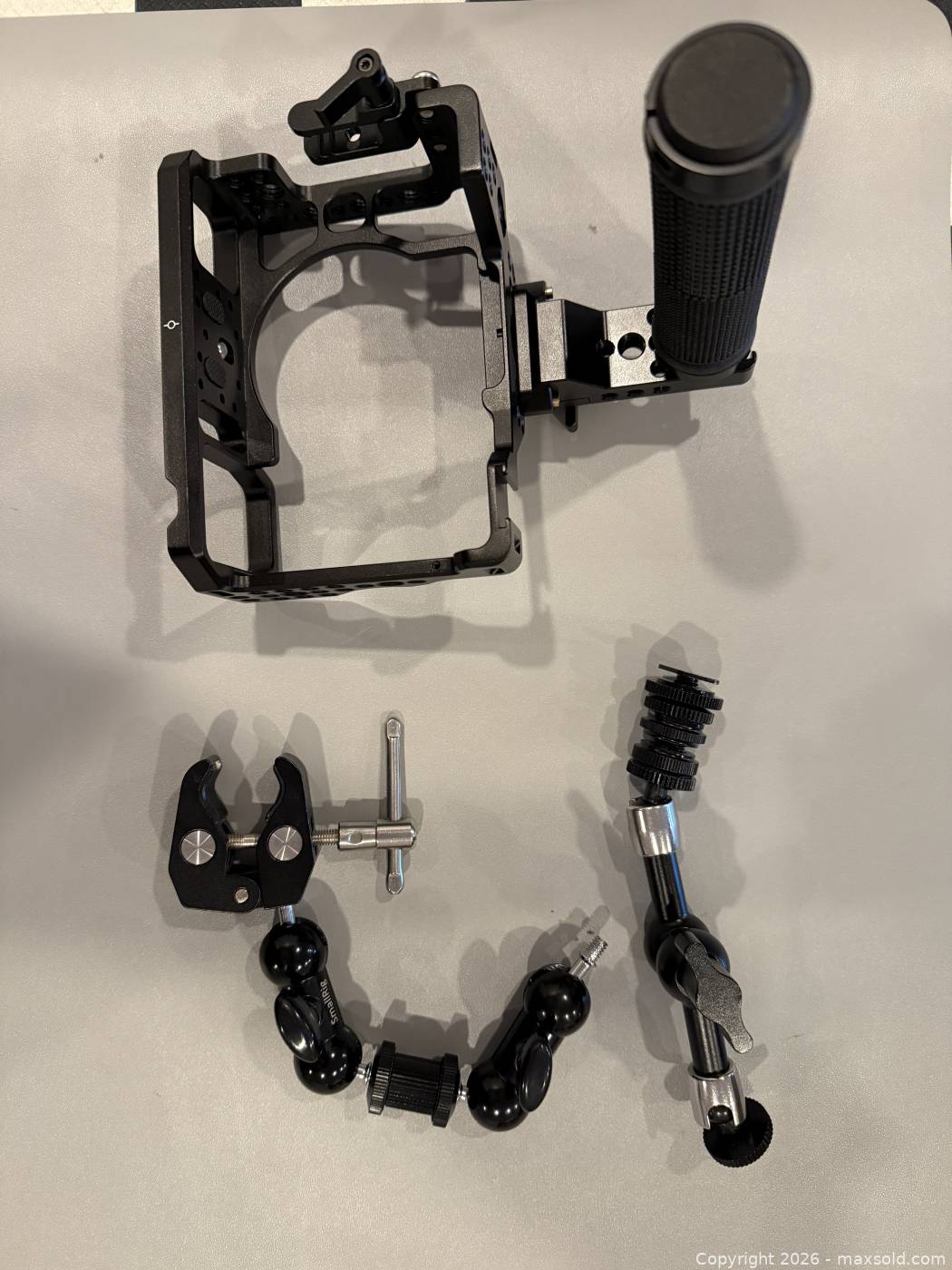 SmallRig camera cage kit with handle and accessory arms | Maxsold