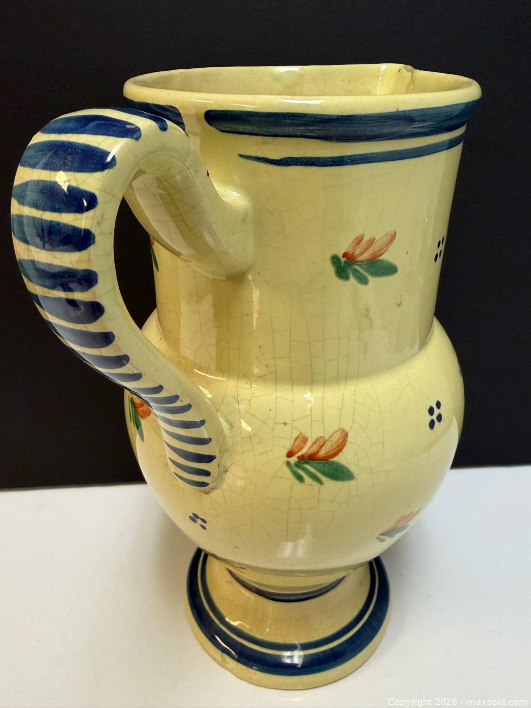 Henriot Quimper yellow faience pitcher | Maxsold