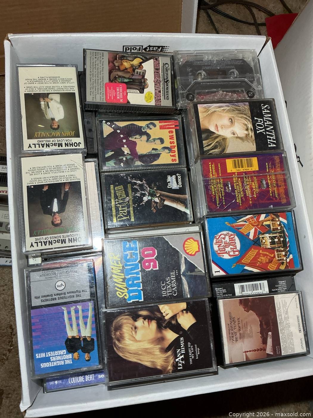 Box of vintage cassette tapes, various genres | Maxsold
