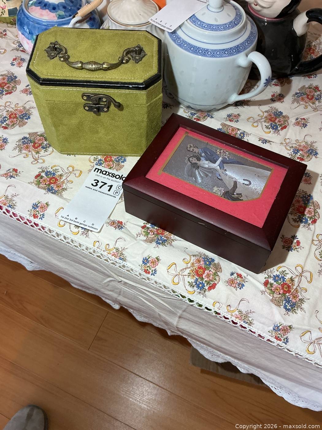 Two jewelry boxes with assorted necklaces | Maxsold