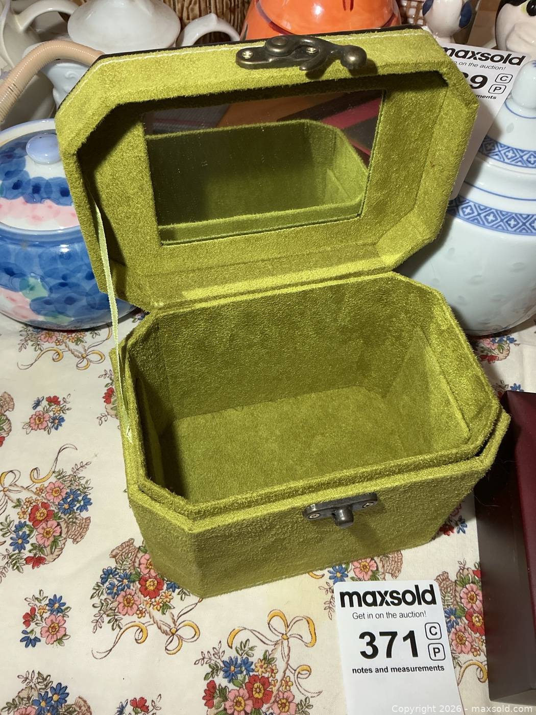 Two jewelry boxes with assorted necklaces | Maxsold