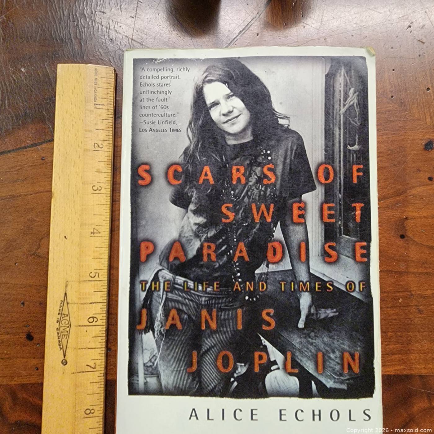 Scars of Sweet Paradise Paperback Biography | Maxsold