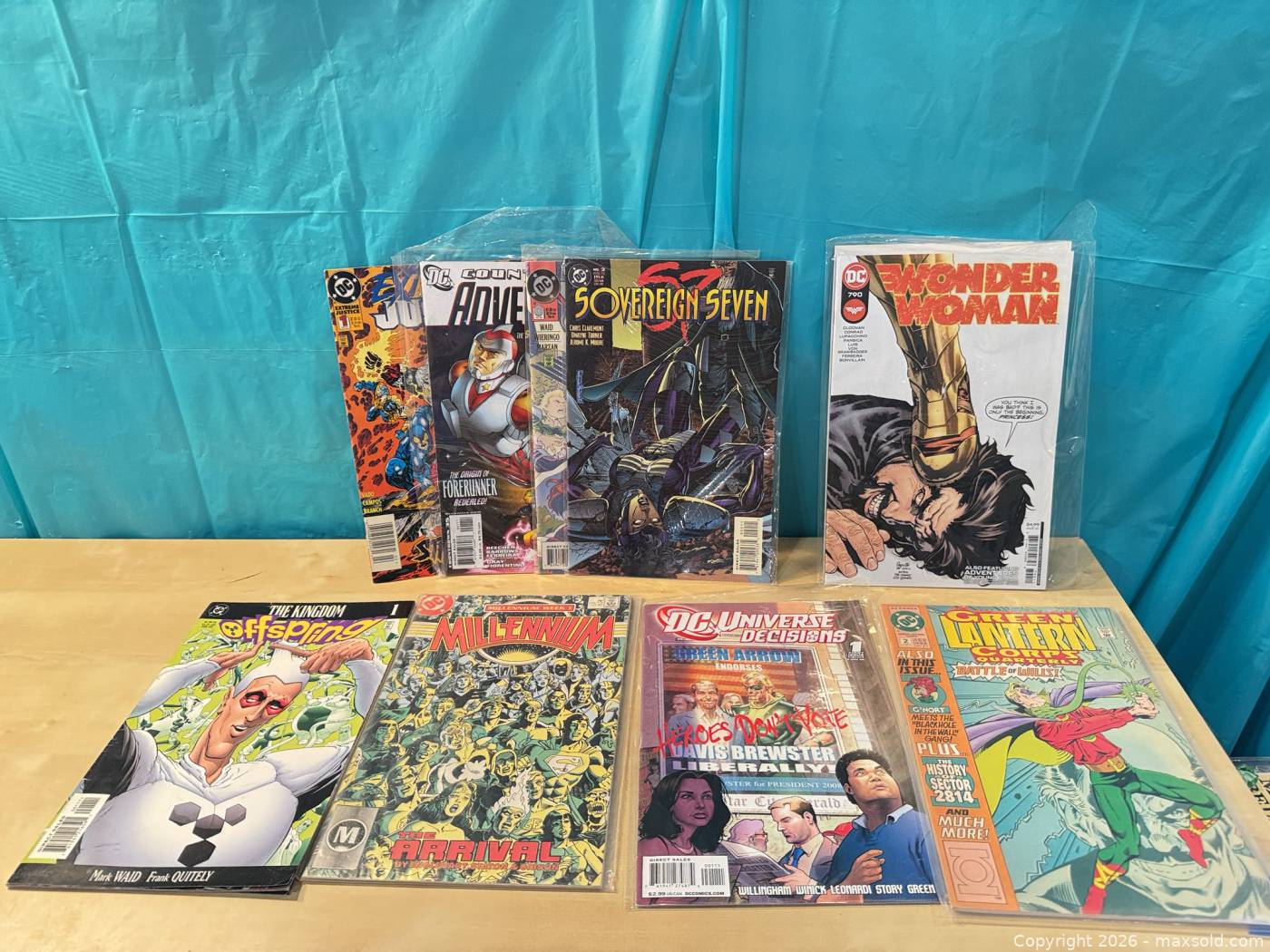 Eight DC comic books – Wonder Woman, Green Lantern, Aquaman, Sovereign ...