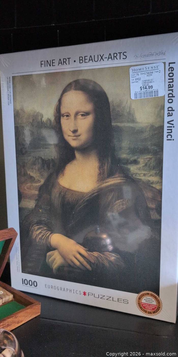 Sealed Mona Lisa puzzle, sealed cards, dice cup, two bells | Maxsold