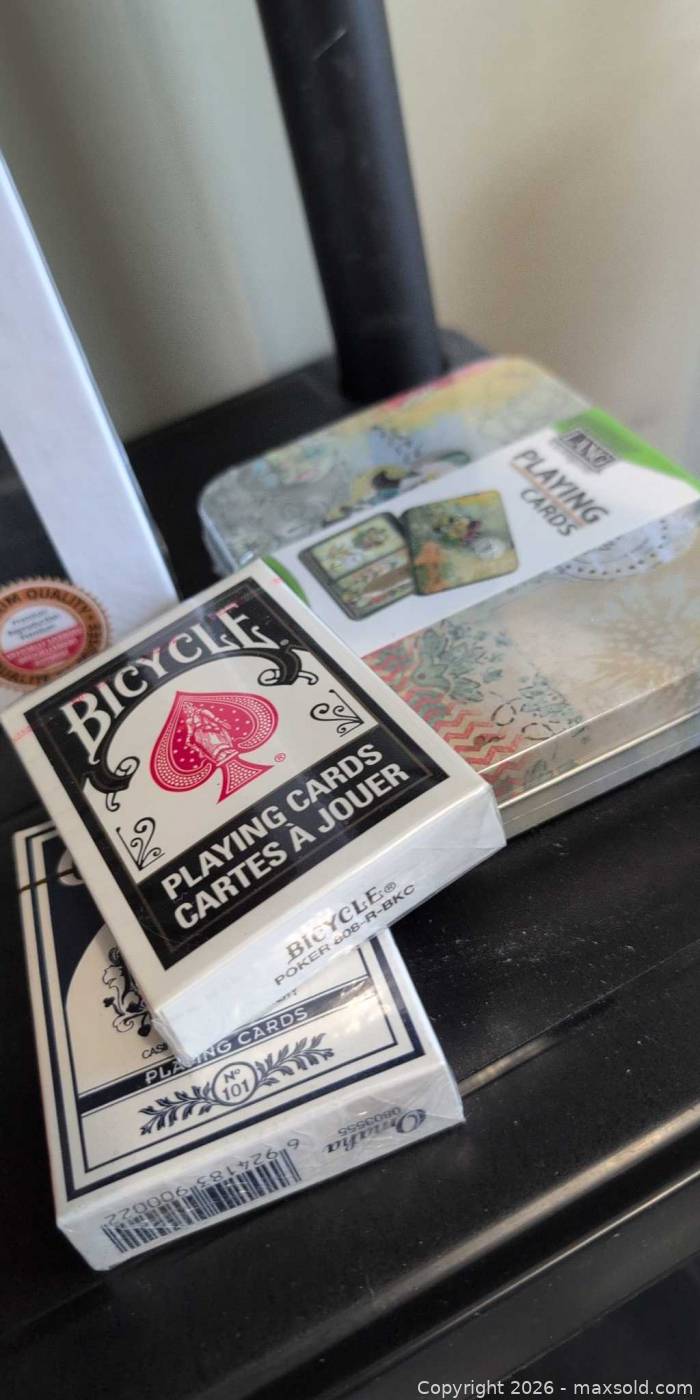 Sealed Mona Lisa puzzle, sealed cards, dice cup, two bells | Maxsold