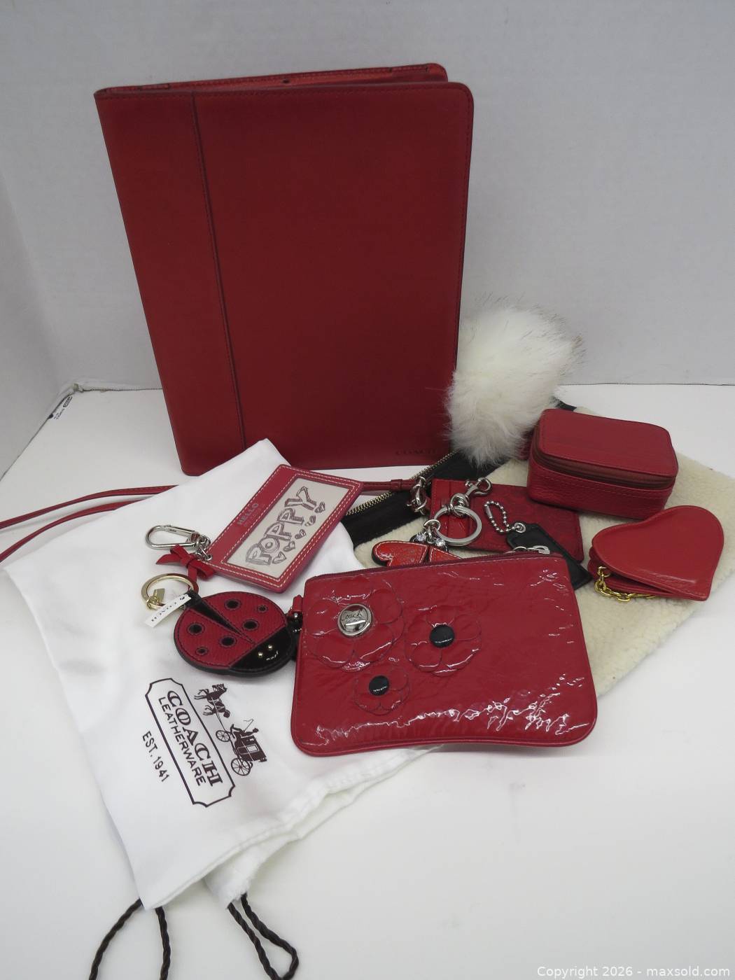Coach red leather tablet folio, pouches & charms | Maxsold