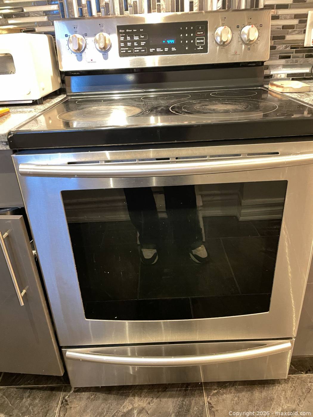 Samsung 30" Stainless Steel Slide-In Electric Range | Maxsold