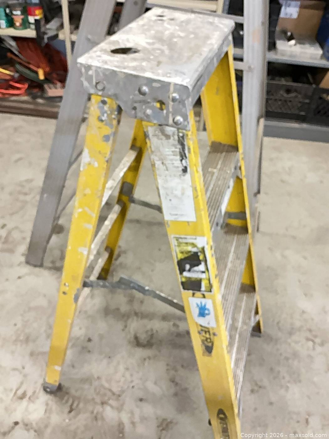 Werner 4 ft & unknown 6 ft A-frame step ladders | Maxsold