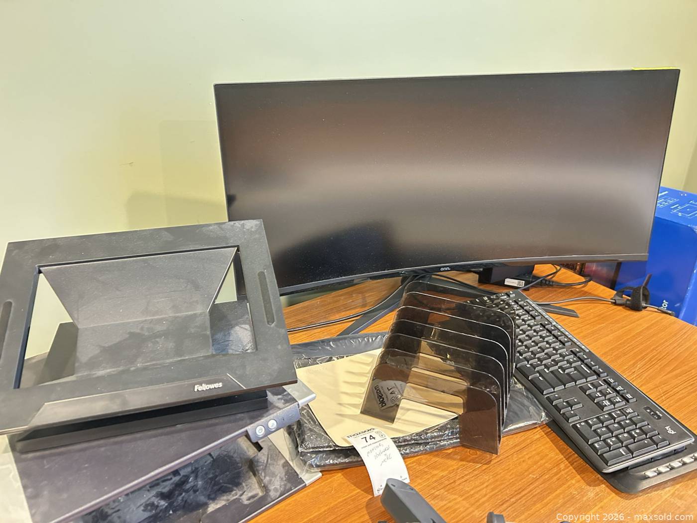 ONN 32-inch curved monitor, two keyboards, Fellowes stands, desk ...