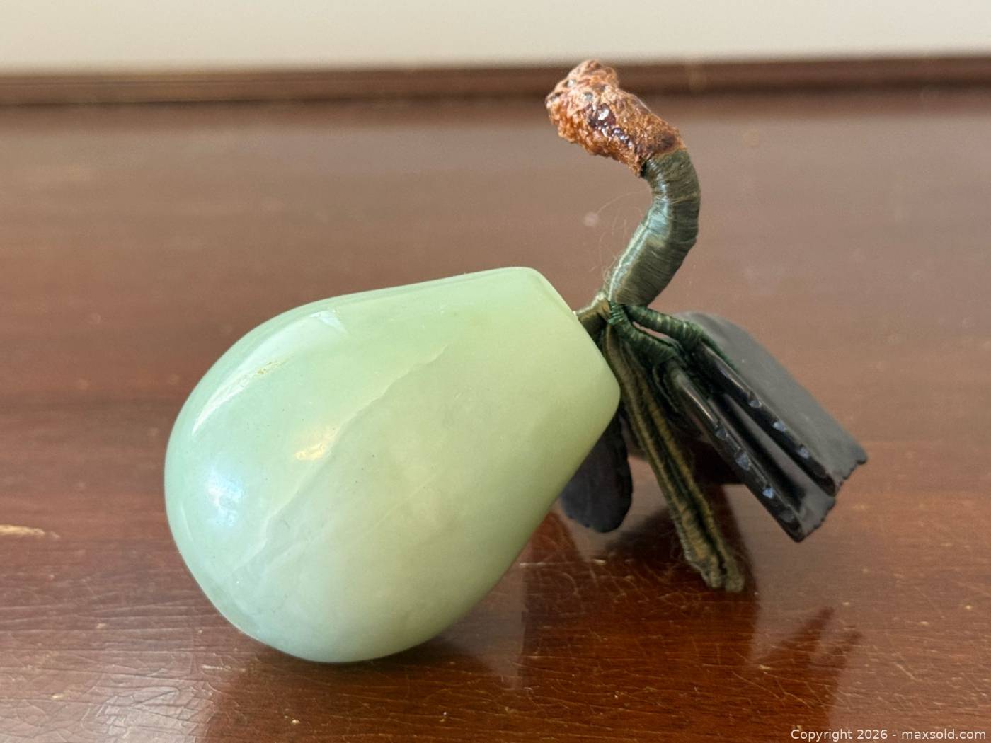 Carved jade pear with stone leaves | Maxsold