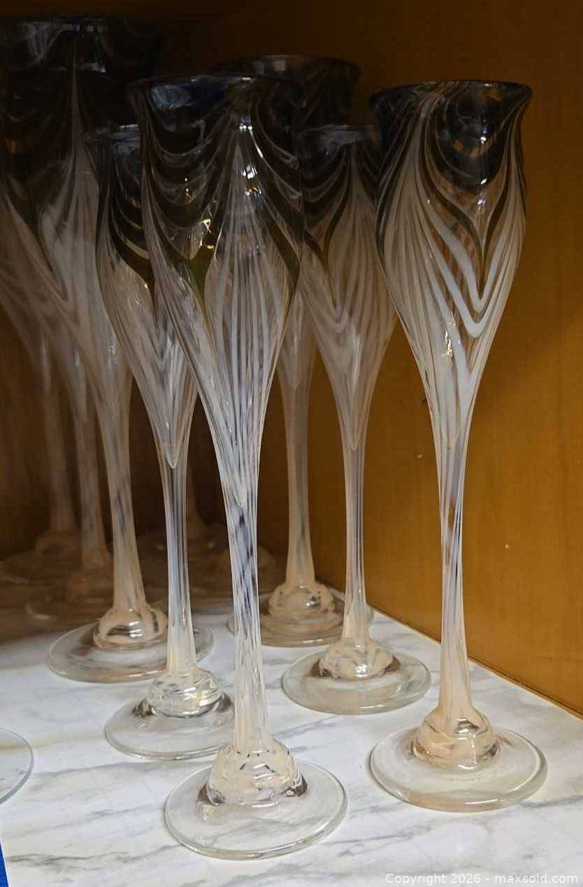 11 Nancy Freeman feather pulled champagne glasses | Maxsold