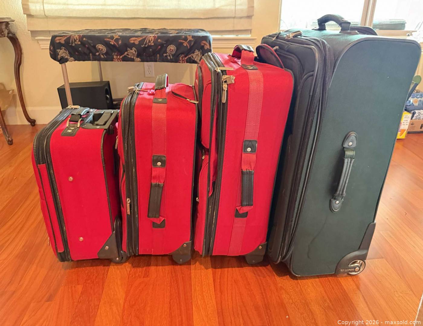 4 rolling suitcases with folding luggage dolly | Maxsold