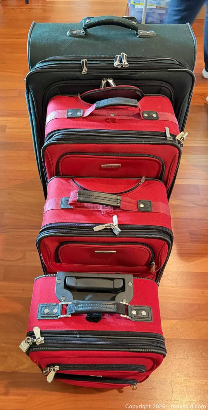 4 rolling suitcases with folding luggage dolly | Maxsold