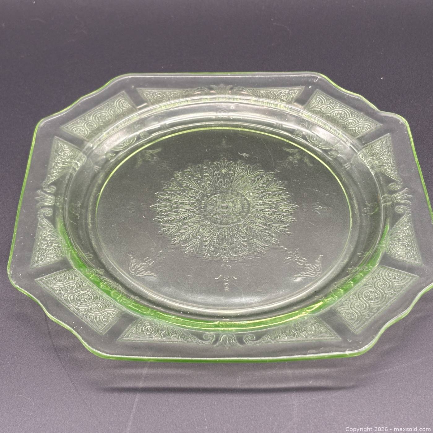 8.5" green uranium glass dinner plate | Maxsold