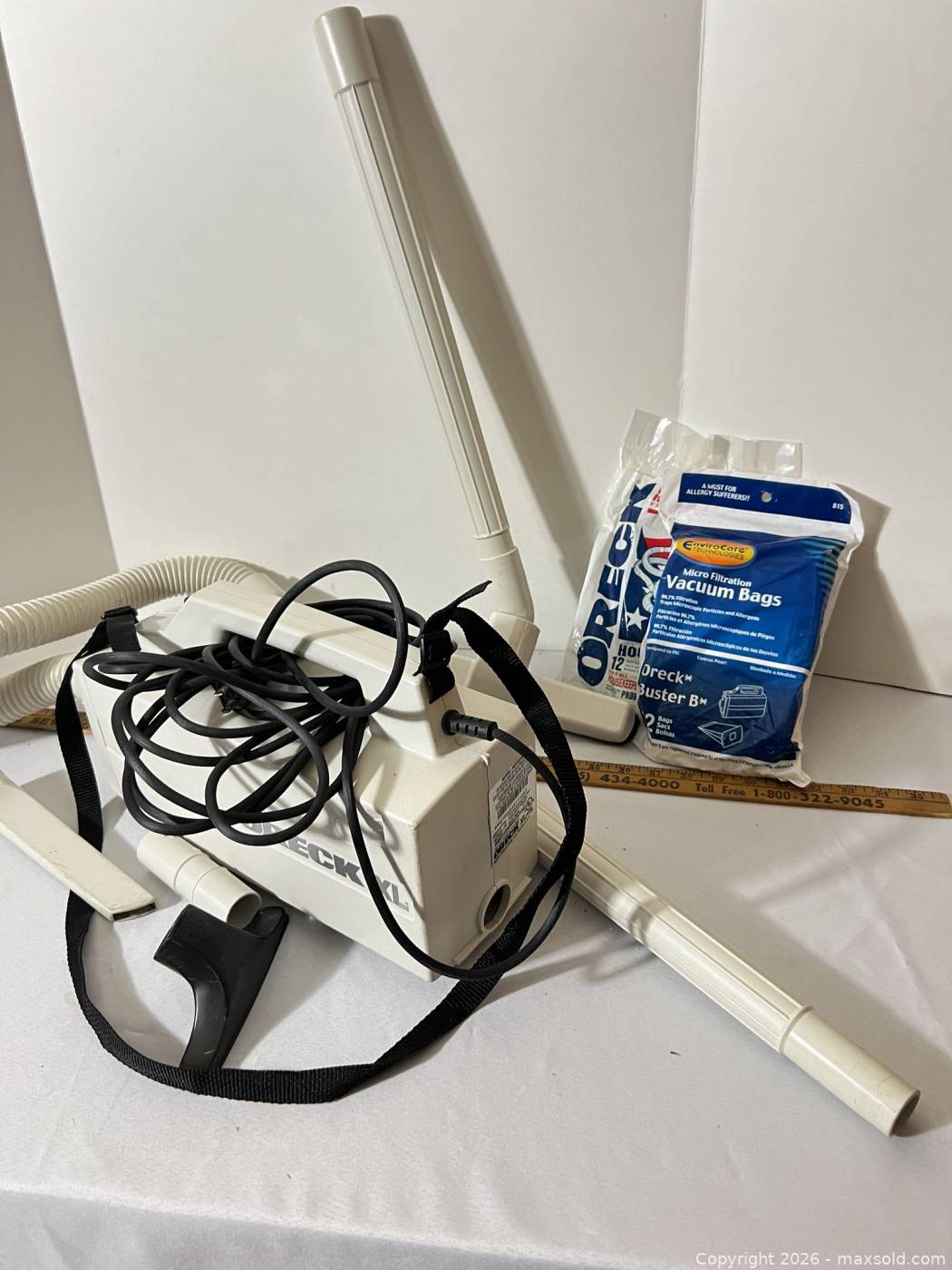 Oreck XL portable canister vacuum with accessories | Maxsold