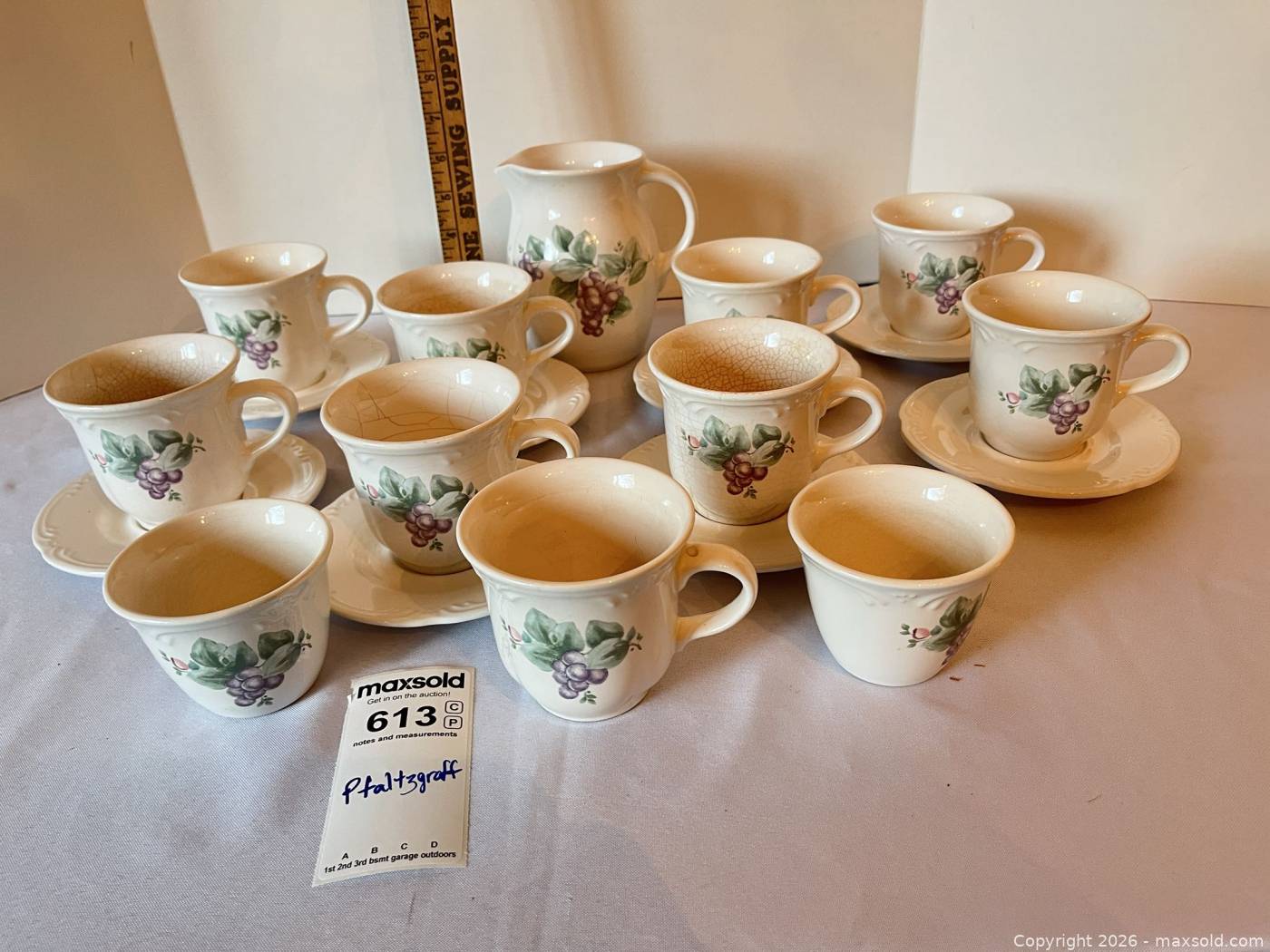 Pfaltzgraff grape motif cups, saucers, creamer | Maxsold