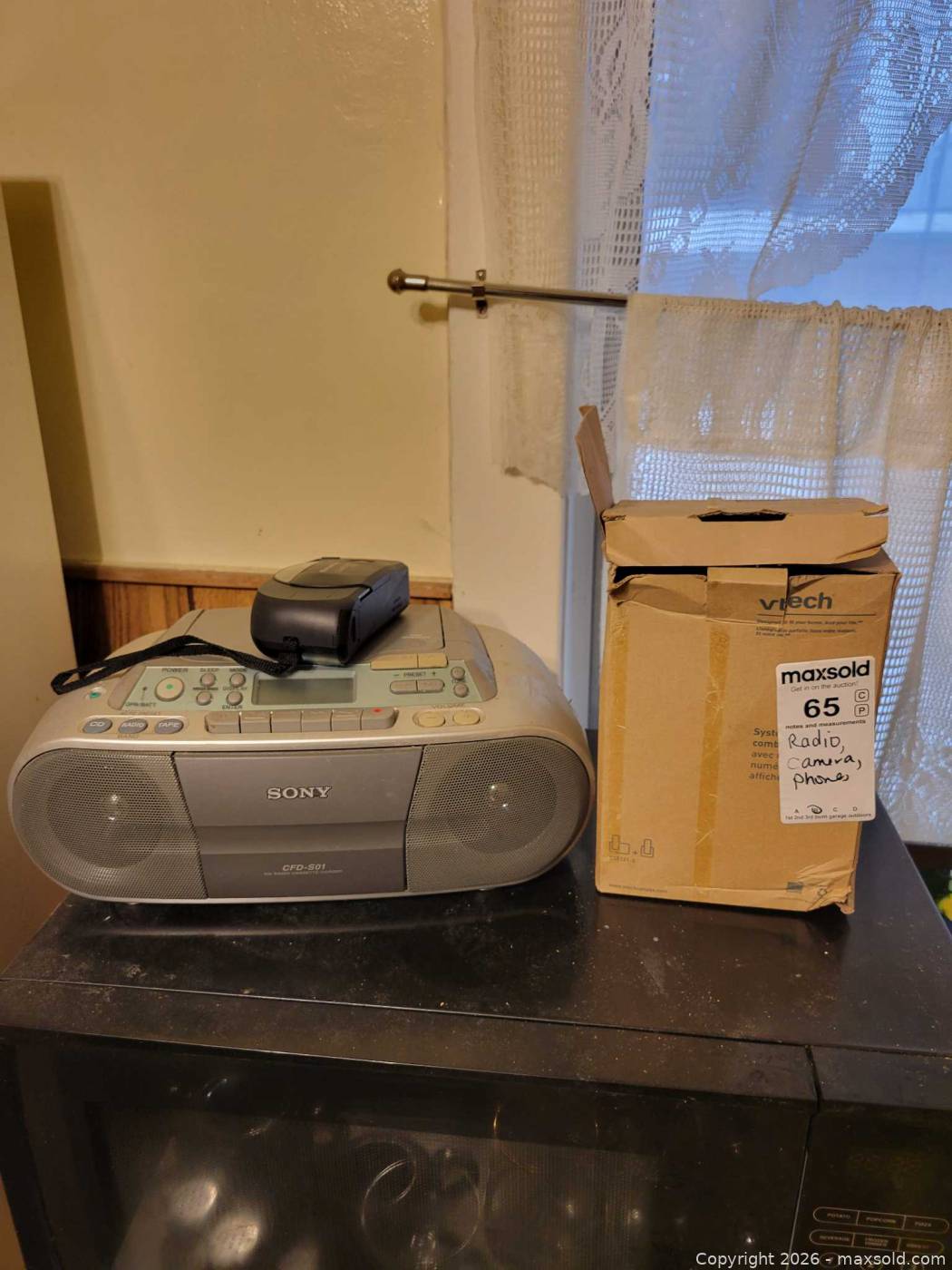 Sony CFD-S01 boombox, Fujifilm Clear Shot Plus camera, VTech cordless ...