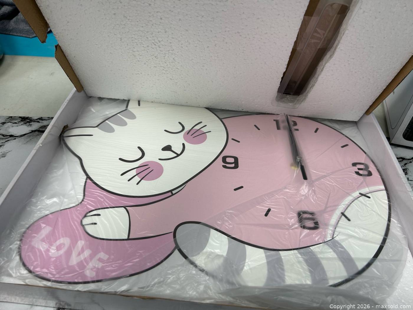 Cat-shaped pink wall clock new in box | Maxsold