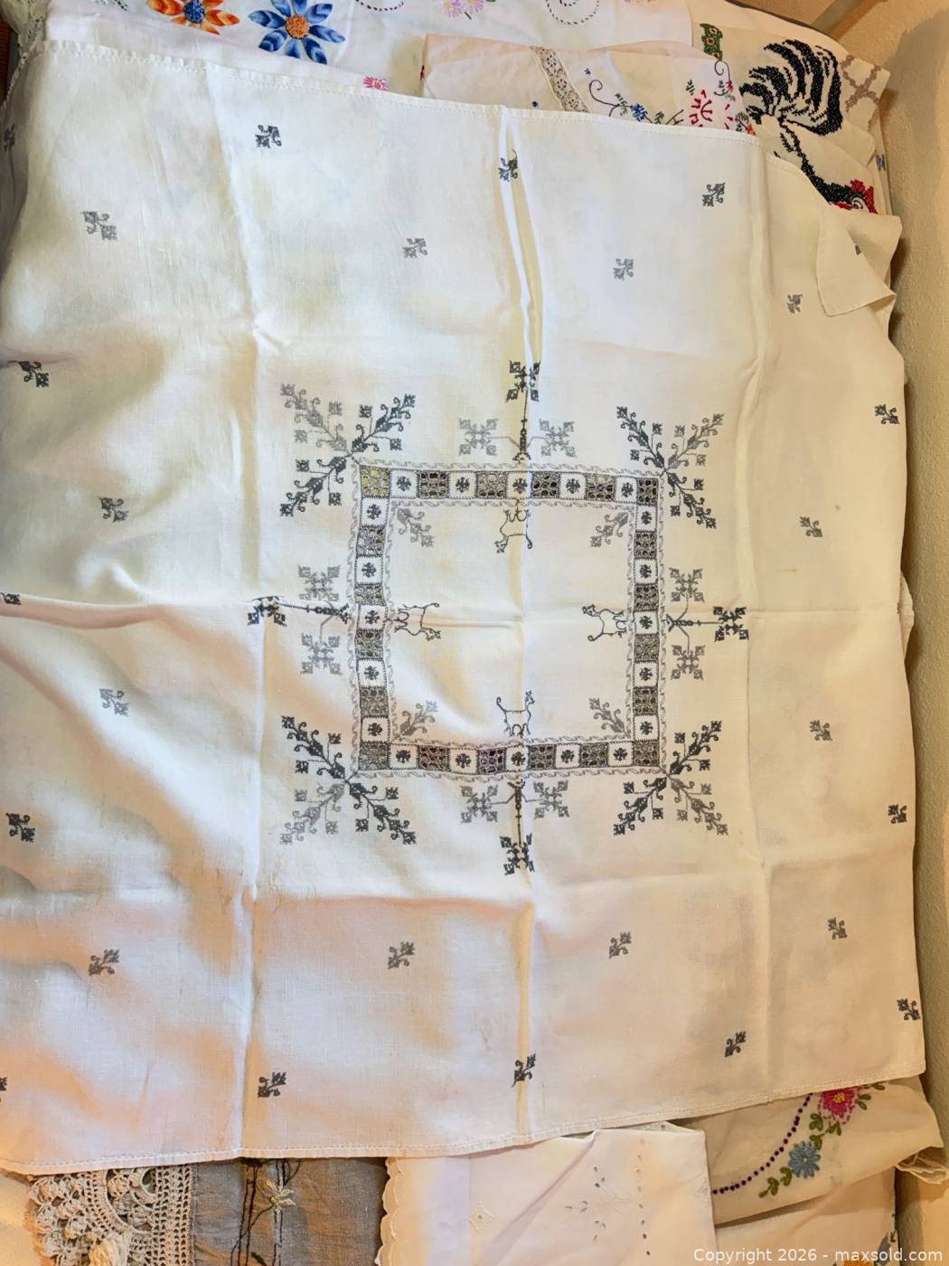 Vintage hand-embroidered table linens | Maxsold