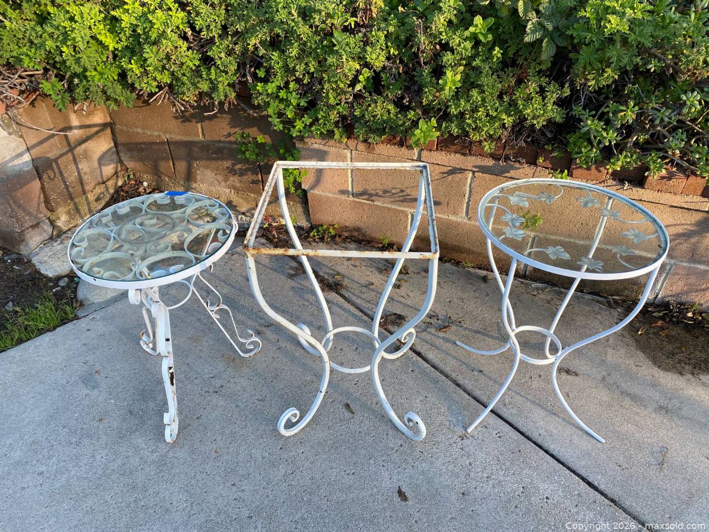 Vintage wrought iron outdoor side tables | Maxsold