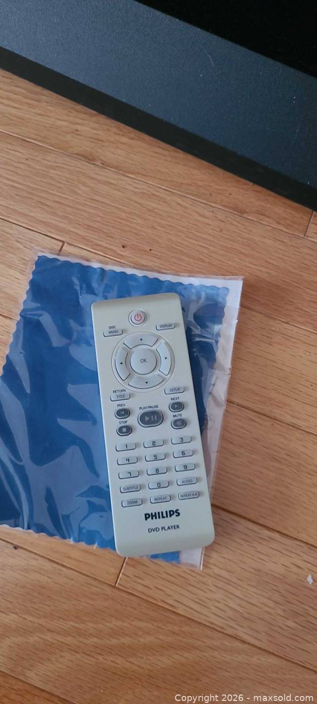 Hitachi VCR M161 and Philips DVD player with remote and cables | Maxsold