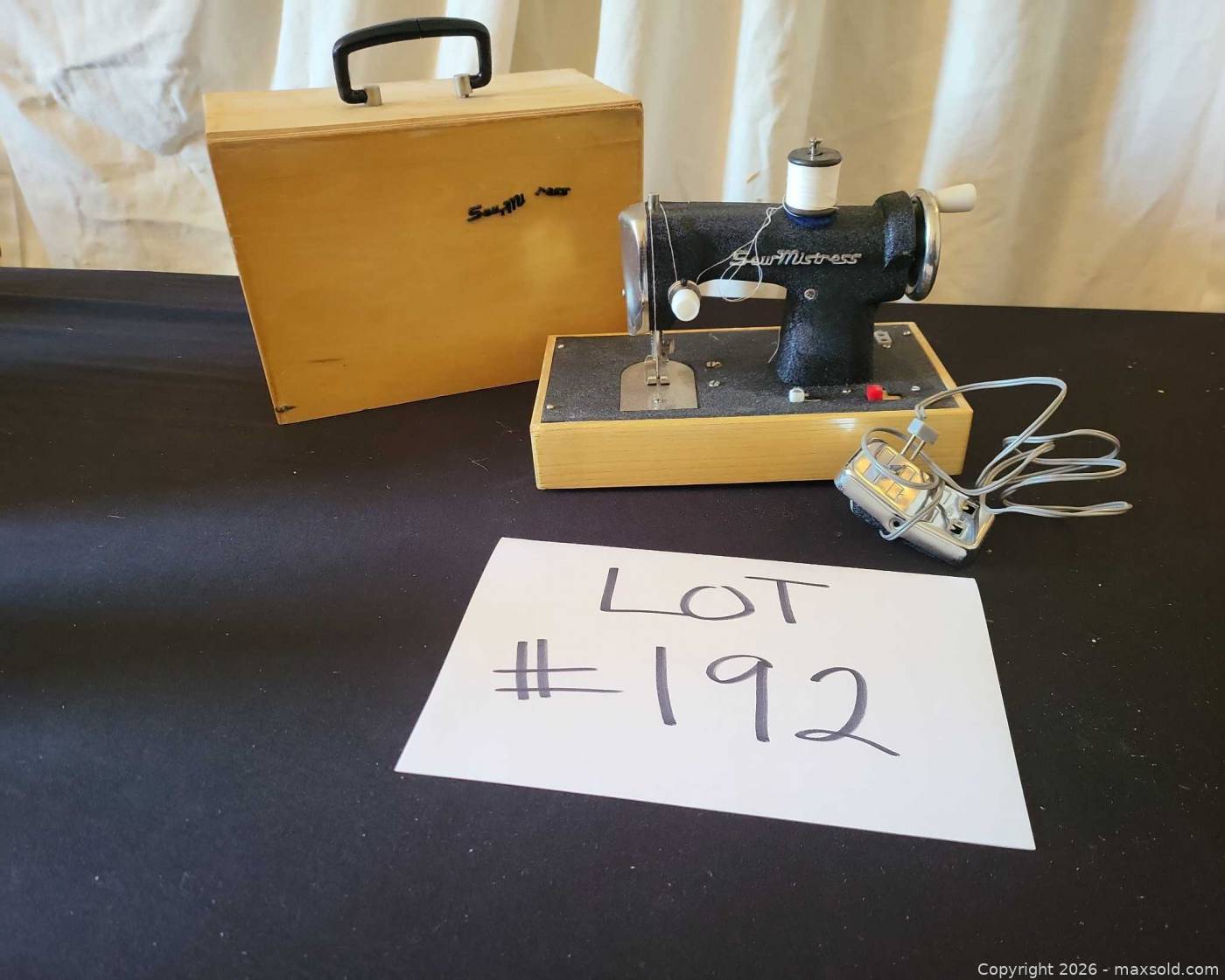 SewMistress portable toy sewing machine with case | Maxsold