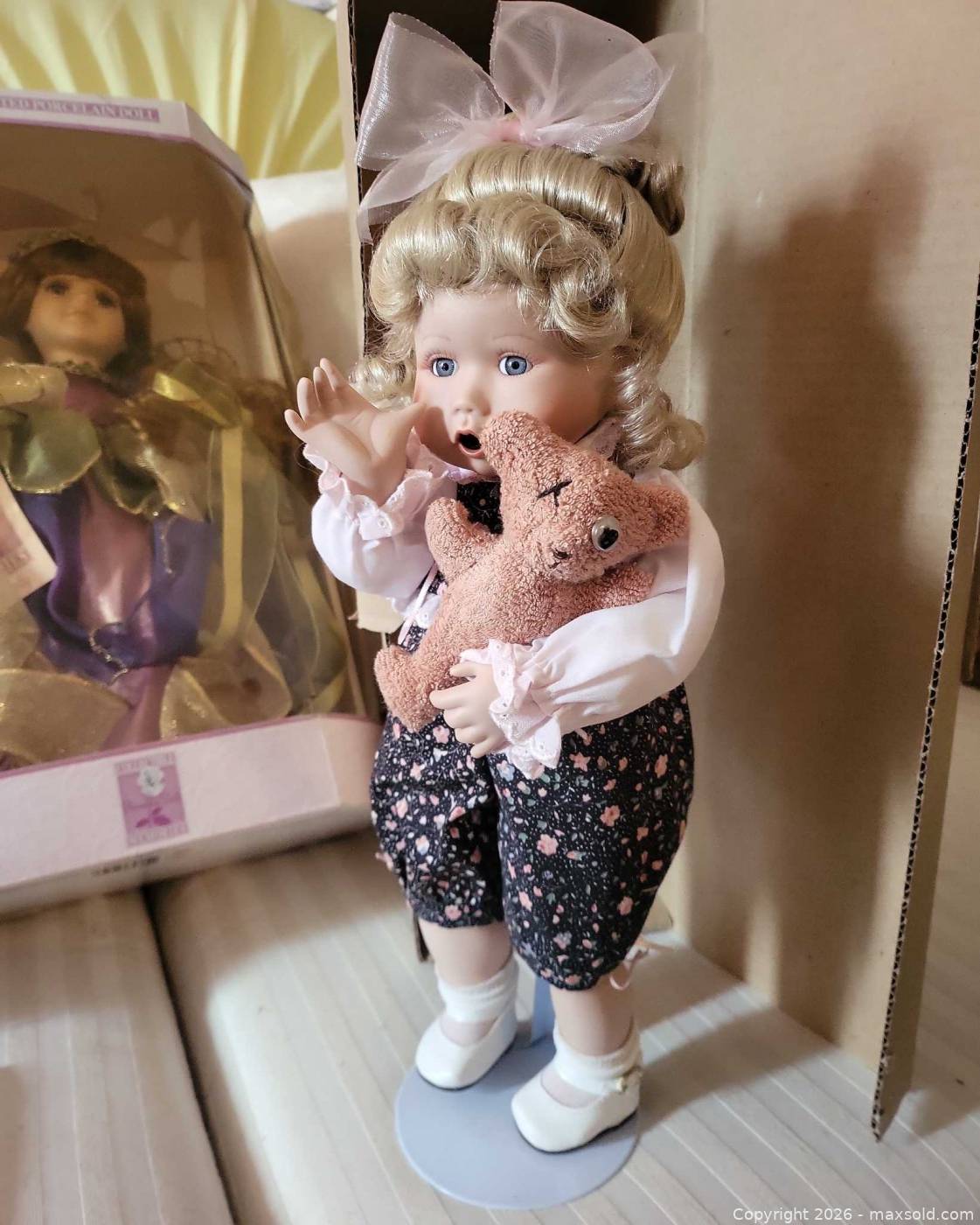 Set of five boxed porcelain dolls | Maxsold