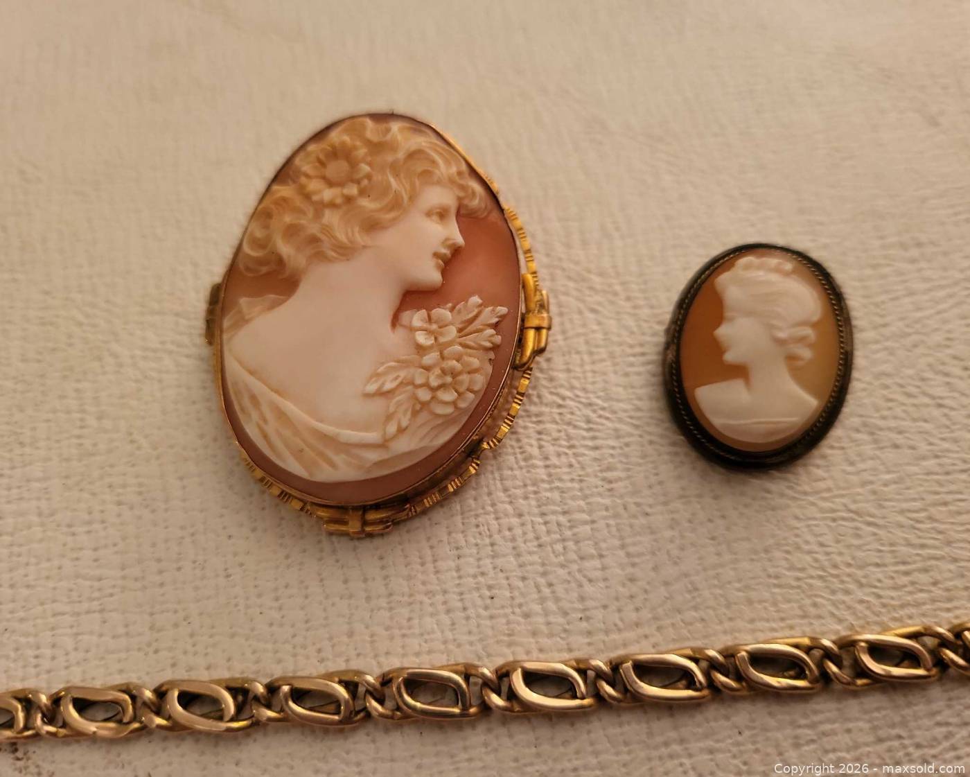 Vintage shell cameo pins and 14k bracelet | Maxsold