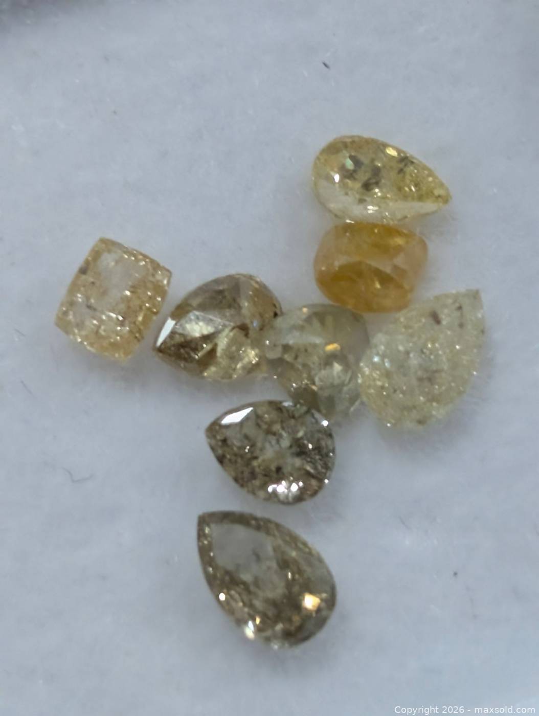 Fancy color loose diamonds approx 1ct | Maxsold
