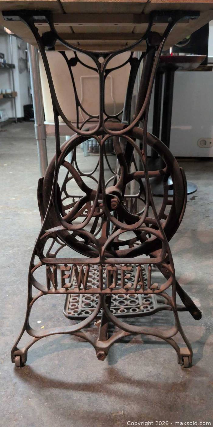 New Ideal cast iron sewing machine table | Maxsold