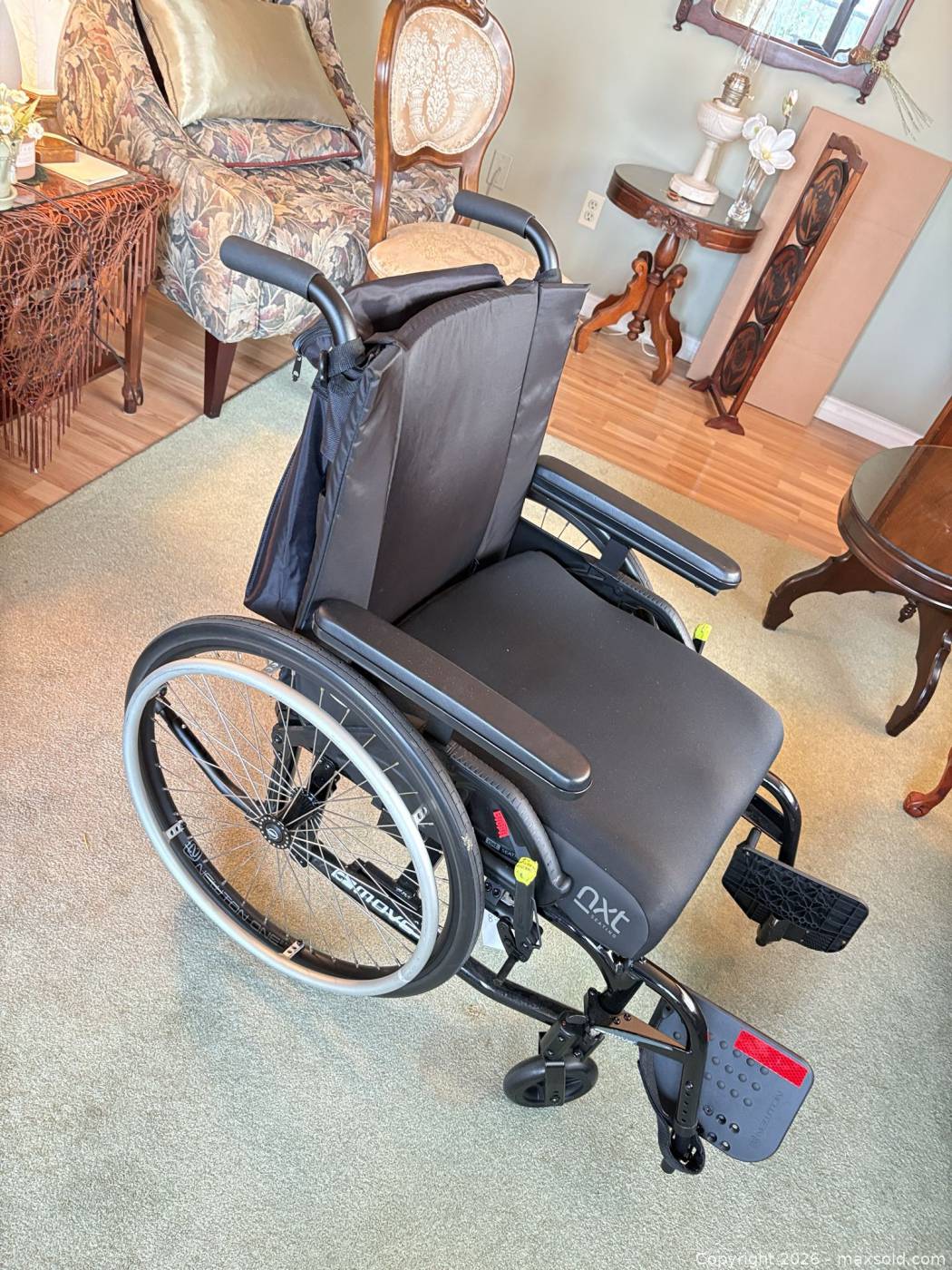 Motion Composites Move QS manual folding wheelchair | Maxsold