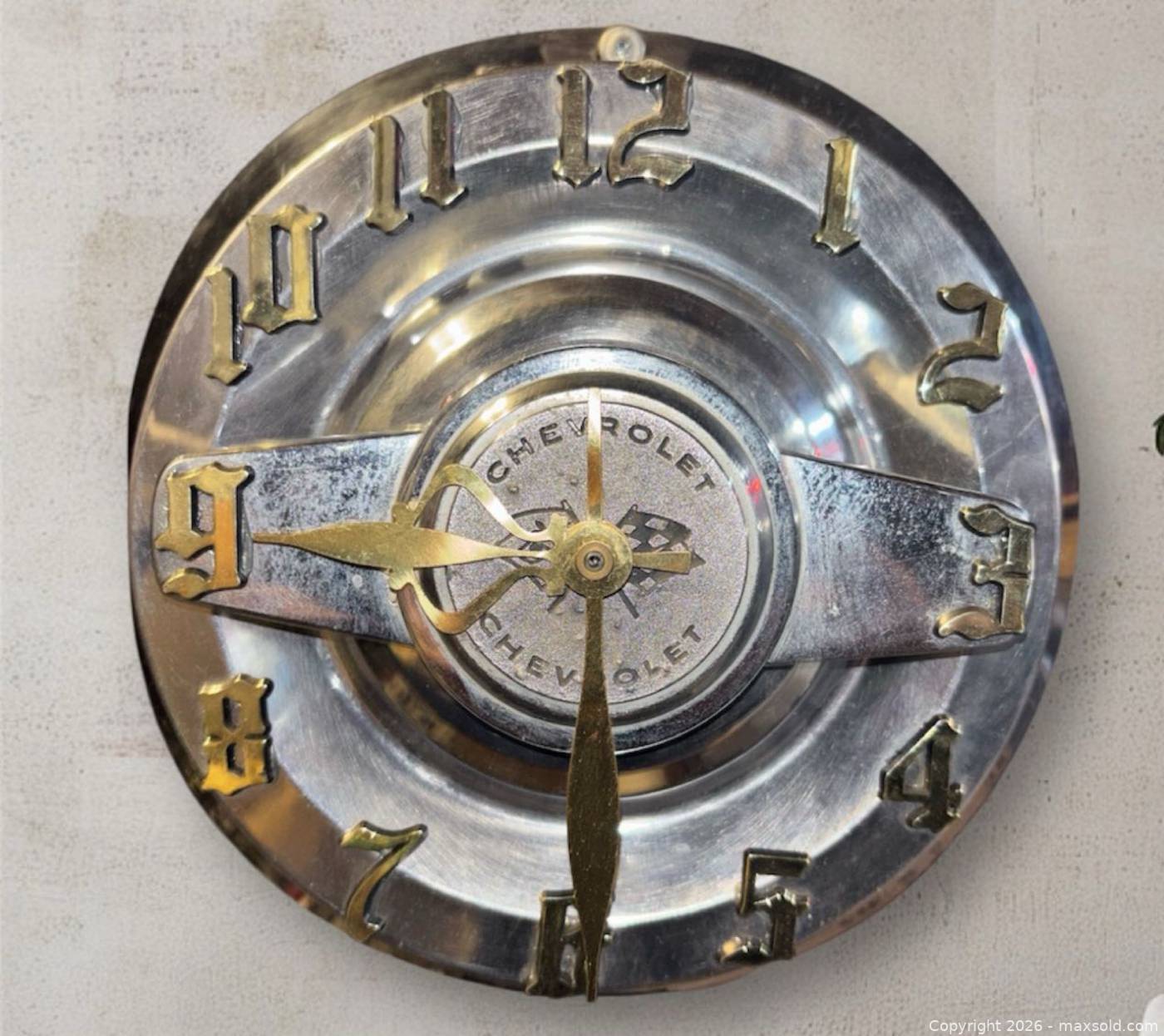 Chevrolet hubcap wall clock | Maxsold