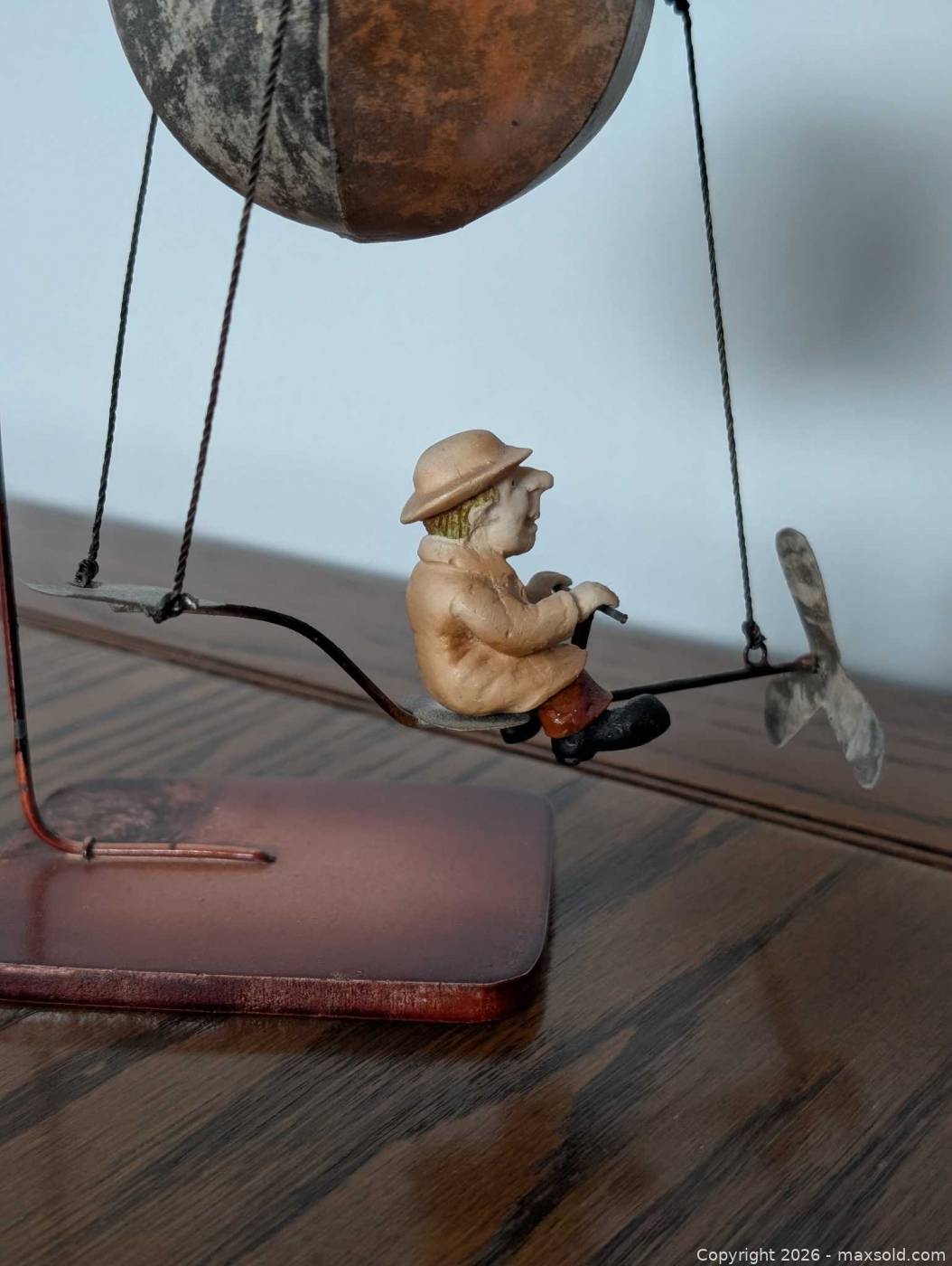 Folk art steampunk aviator sculpture | Maxsold