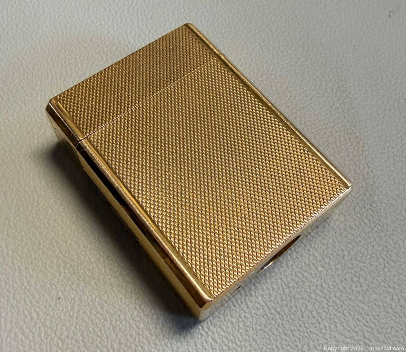 Vintage French S.T. Dupont gold-plated lighter | Maxsold
