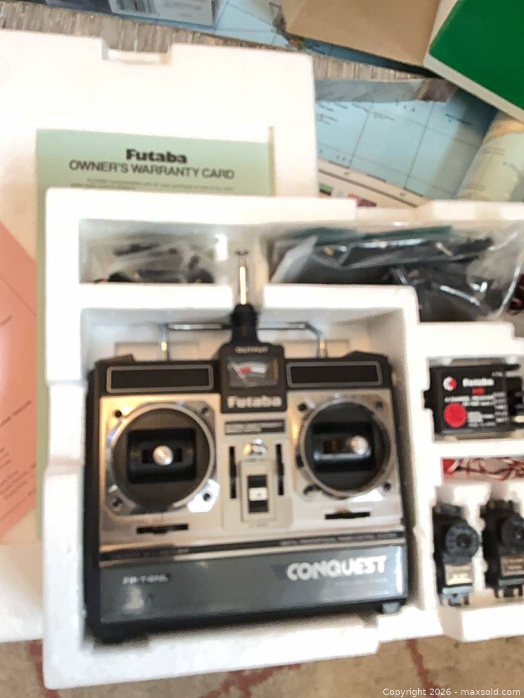 RC airplane model kits and Futaba Conquest set | Maxsold