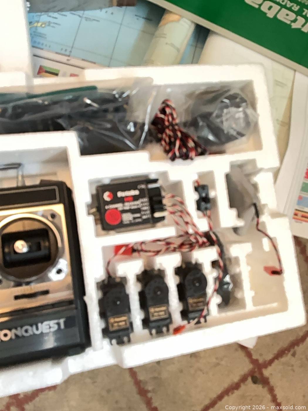 RC airplane model kits and Futaba Conquest set | Maxsold