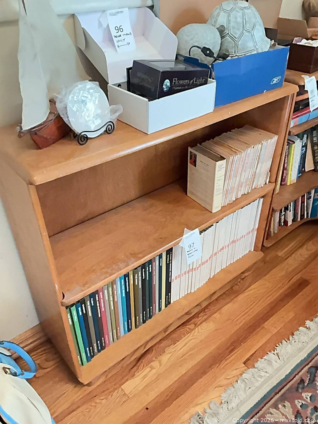 Small light oak 2-shelf bookcase with vintage paperbacks | Maxsold