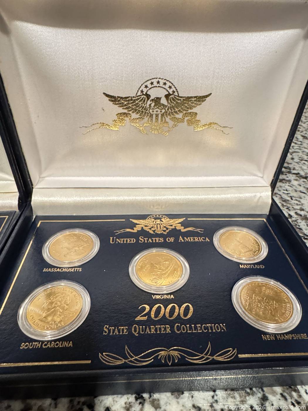 1999 and 2000 24Kt Gold-Plated Coin Sets | Maxsold