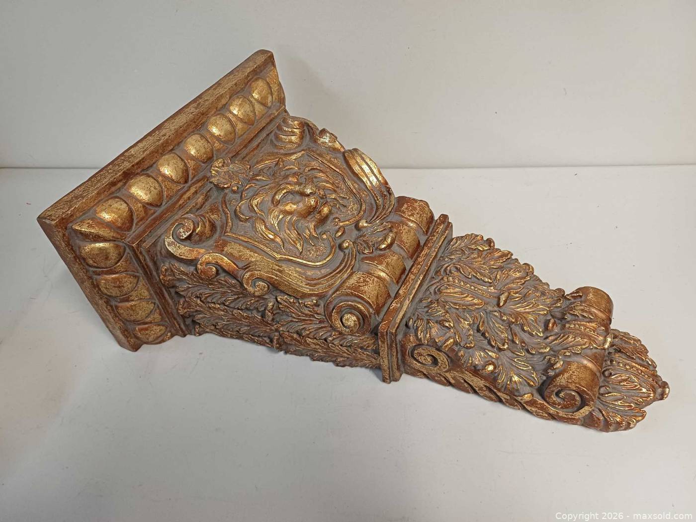 Vintage 20" gold gilt resin lion head wall bracket | Maxsold