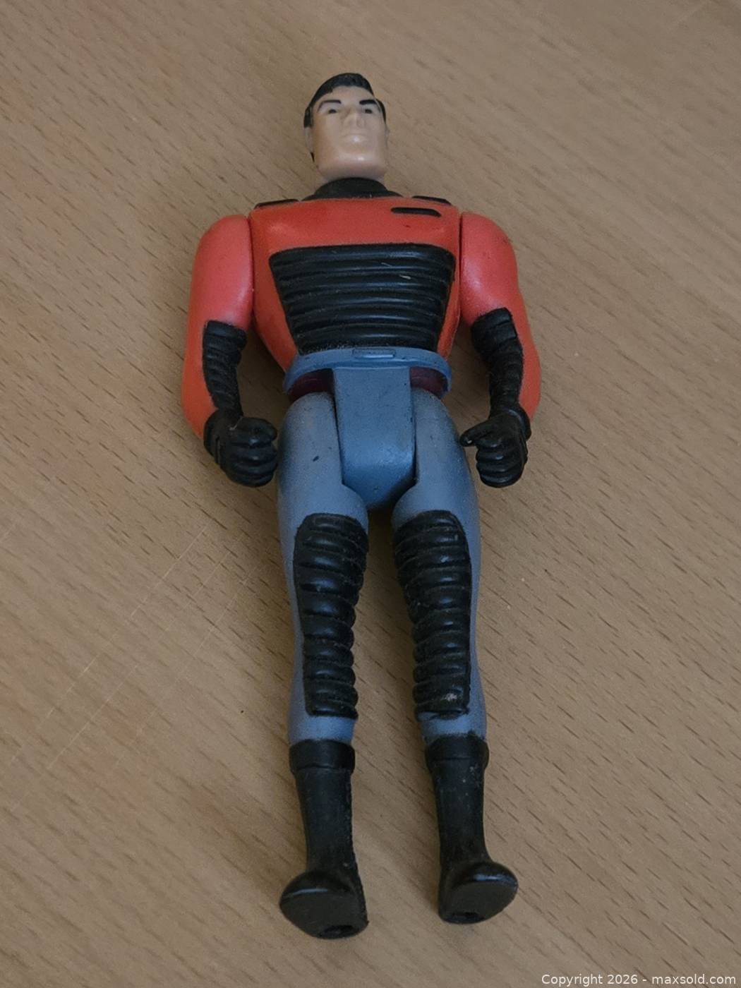 1993 Kenner Bruce Wayne action figure | Maxsold