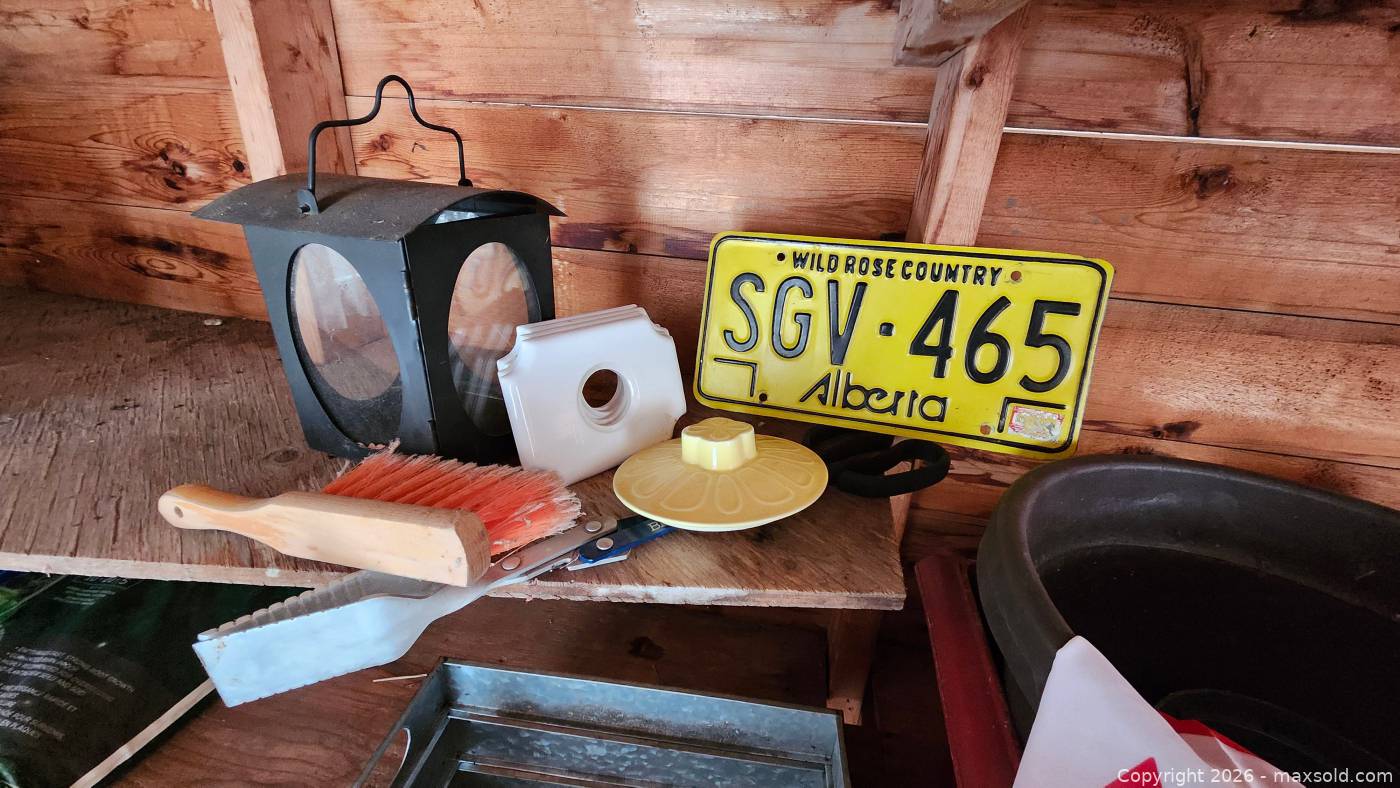 Assorted garden pots, planters, trays, lantern, vintage Alberta license ...