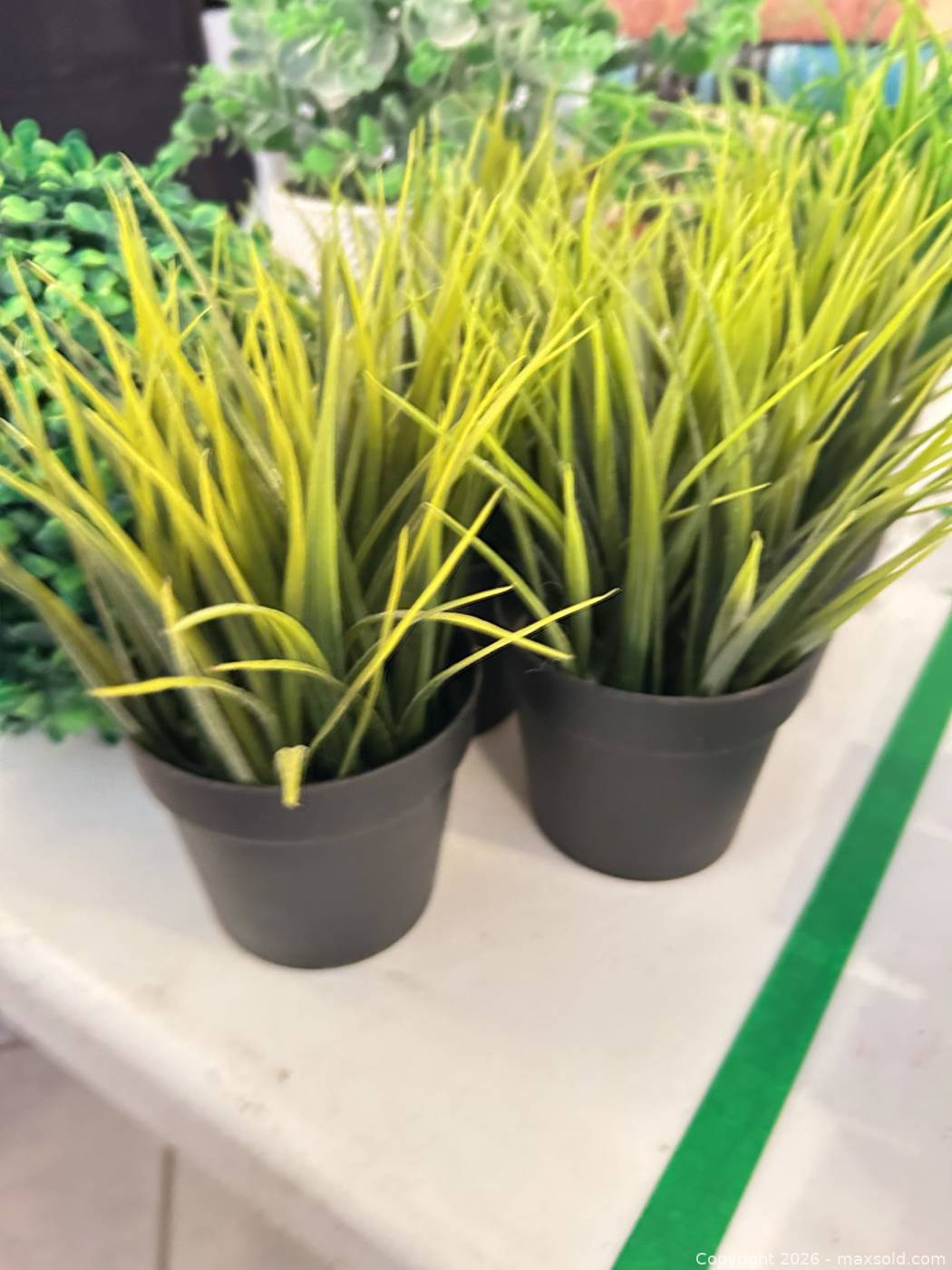 Lot of 8 faux decorative plants with planters | Maxsold