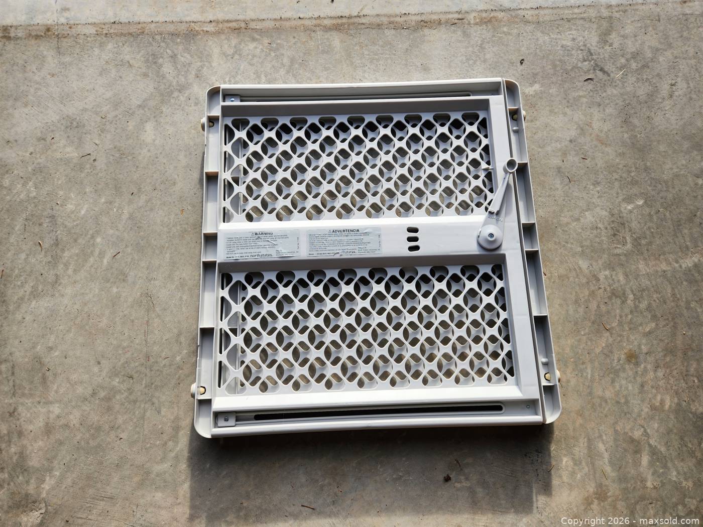 Adjustable plastic stair safety gate | Maxsold