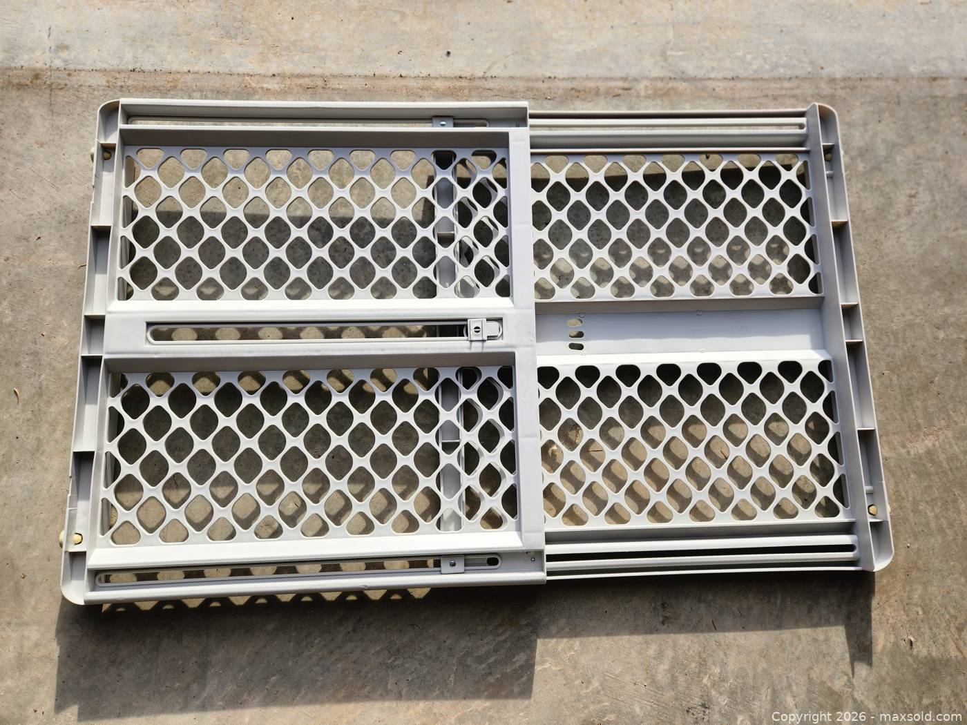 Adjustable plastic stair safety gate | Maxsold