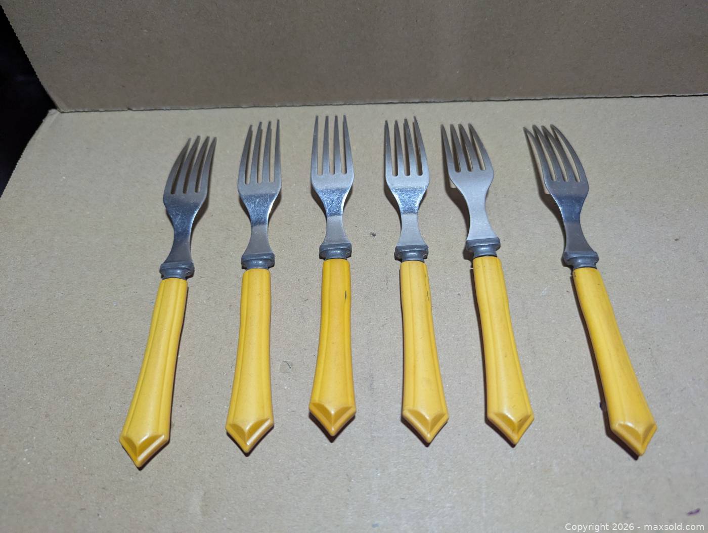 Oxford Hall stainless steel forks, Bakelite handles | Maxsold