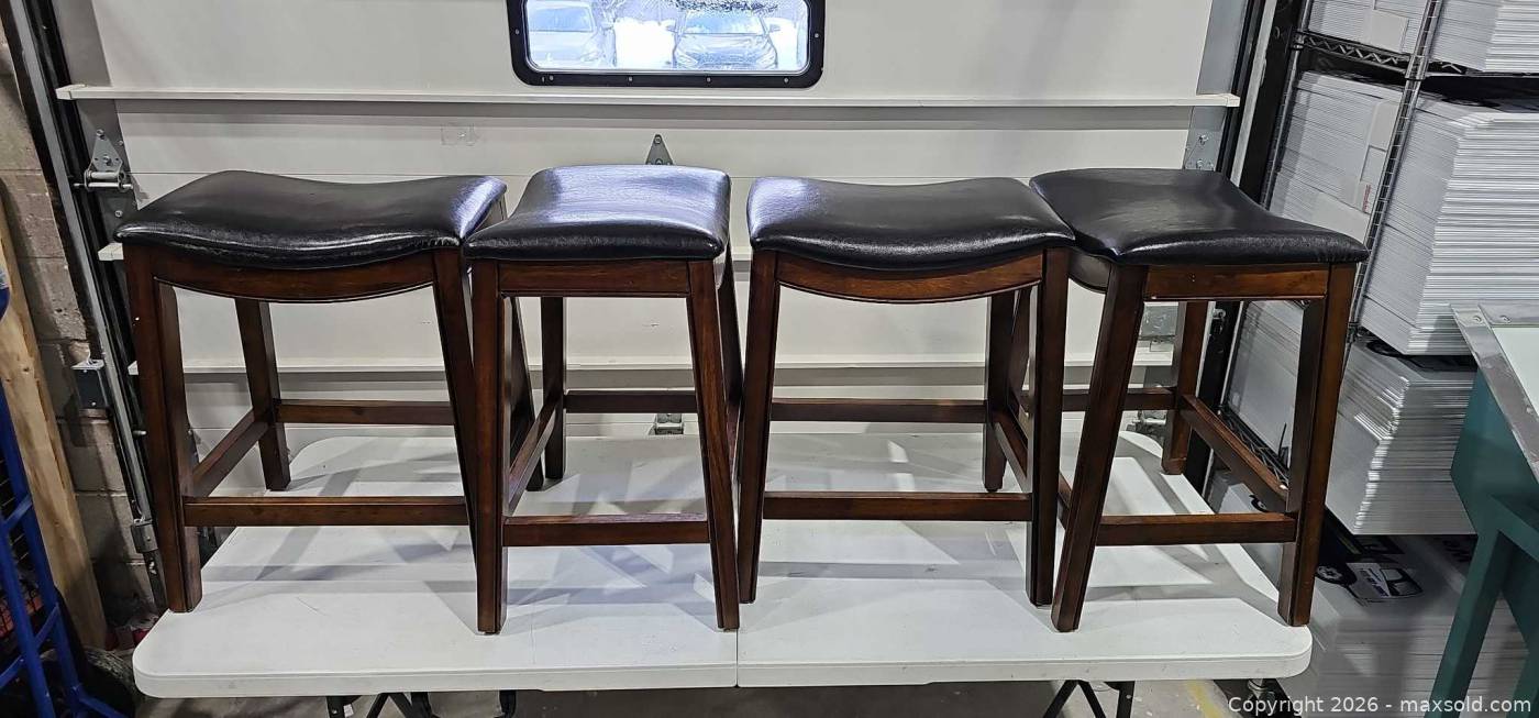 Set of 4 backless counter stools, wood frame, black vinyl seats | Maxsold