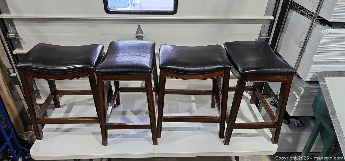 Set of 4 backless counter stools, wood frame, black vinyl seats | Maxsold