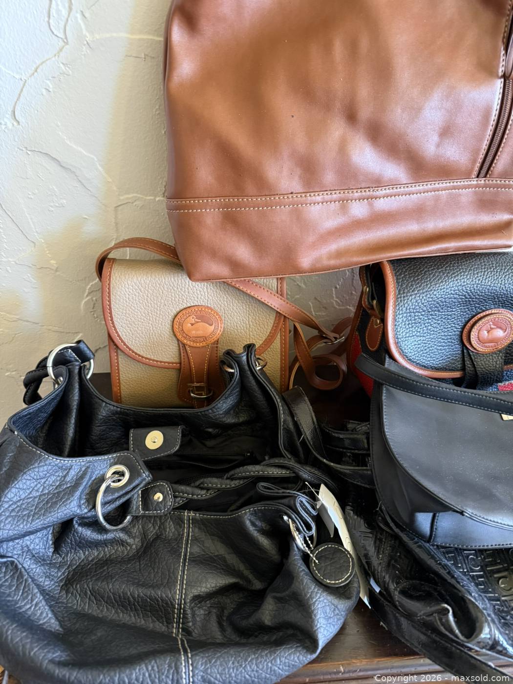 Five assorted purses and crossbody bags | Maxsold