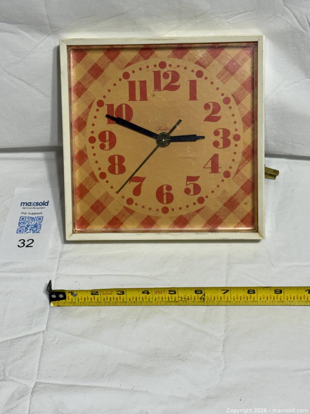 Tradition electric square wall clock | Maxsold